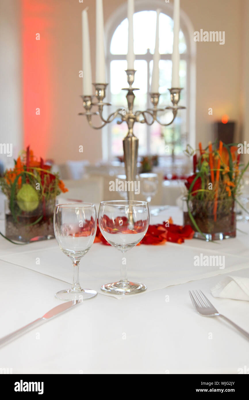 covered table in the restaurant Stock Photo - Alamy