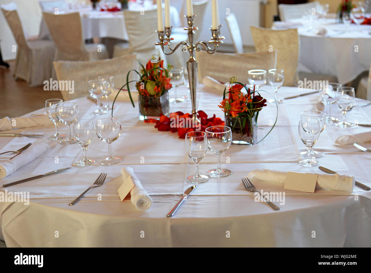 covered table in the restaurant Stock Photo - Alamy