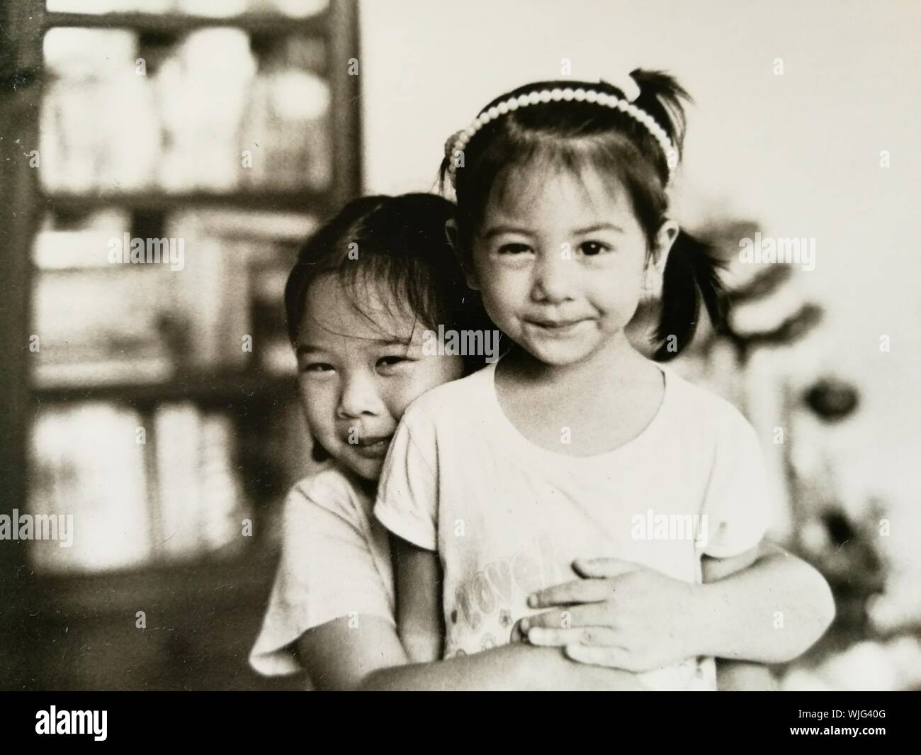 Asian Sisters Smiling High Resolution Stock Photography and Images - Alamy