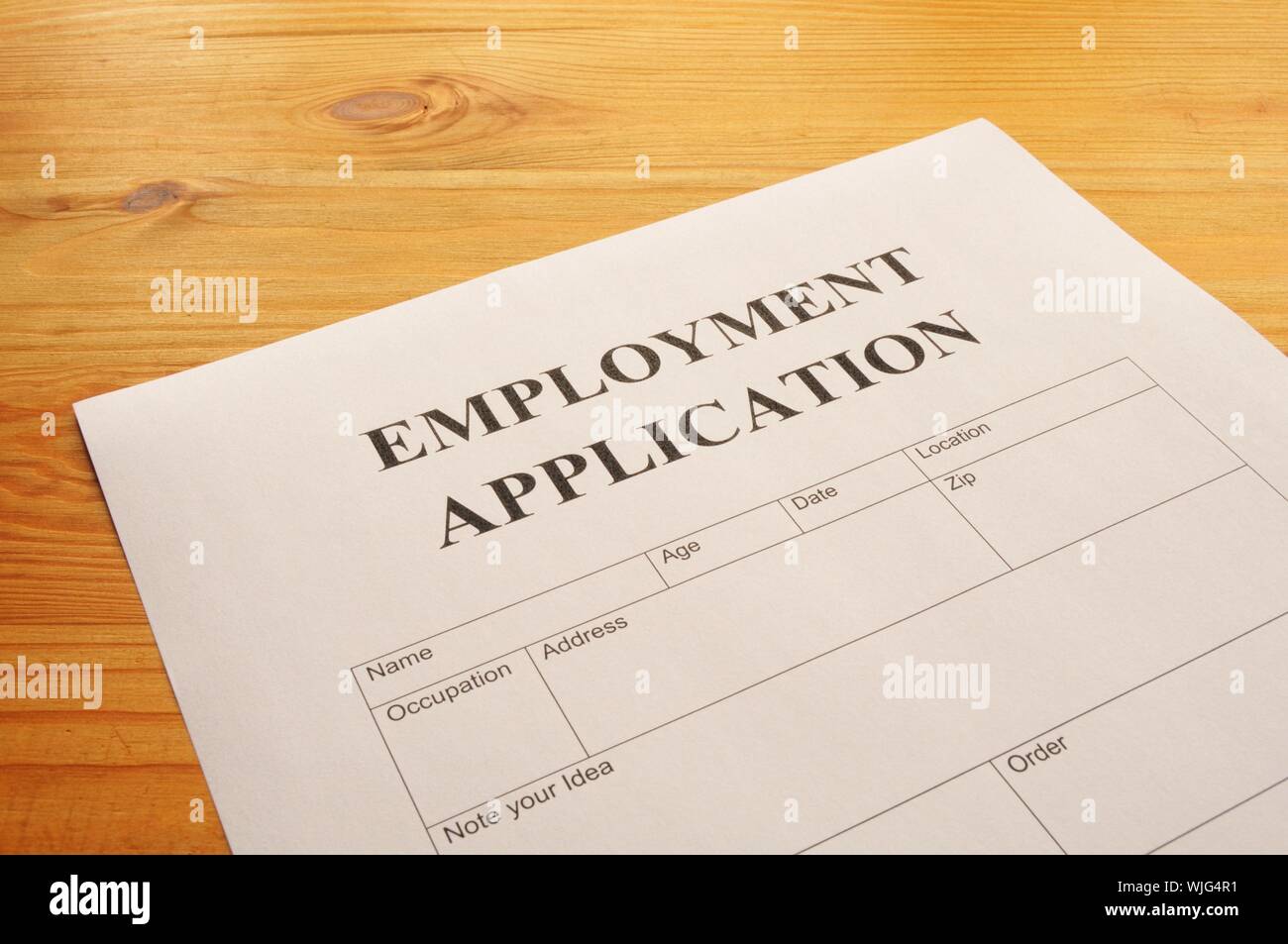 employment application form on desk showing job search concept Stock ...