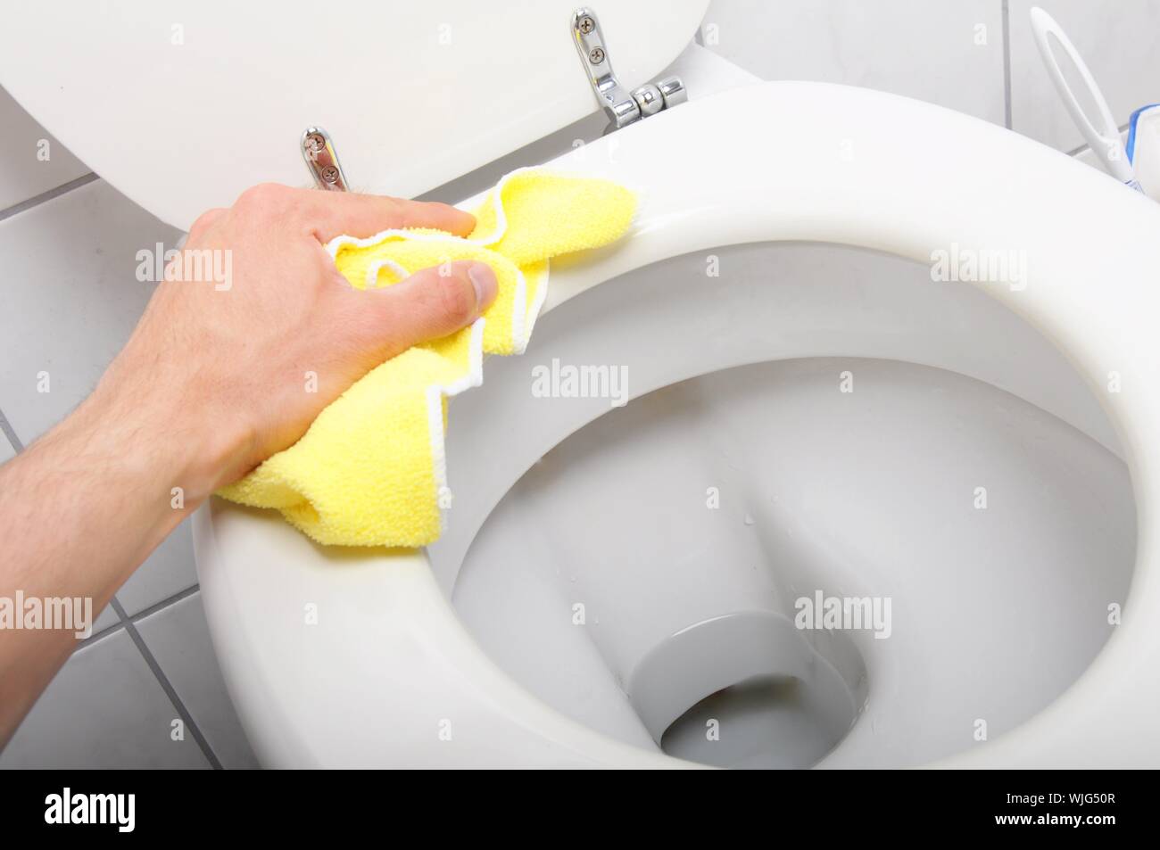 cleaning your home or houshold concept with hand and cloth Stock Photo ...