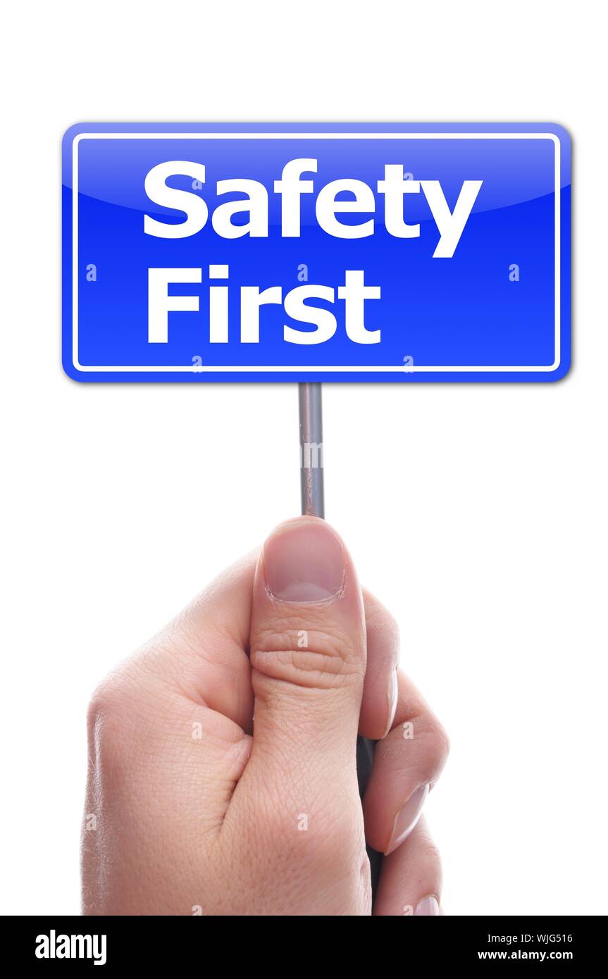 safety first concept with hand word and paper Stock Photo - Alamy