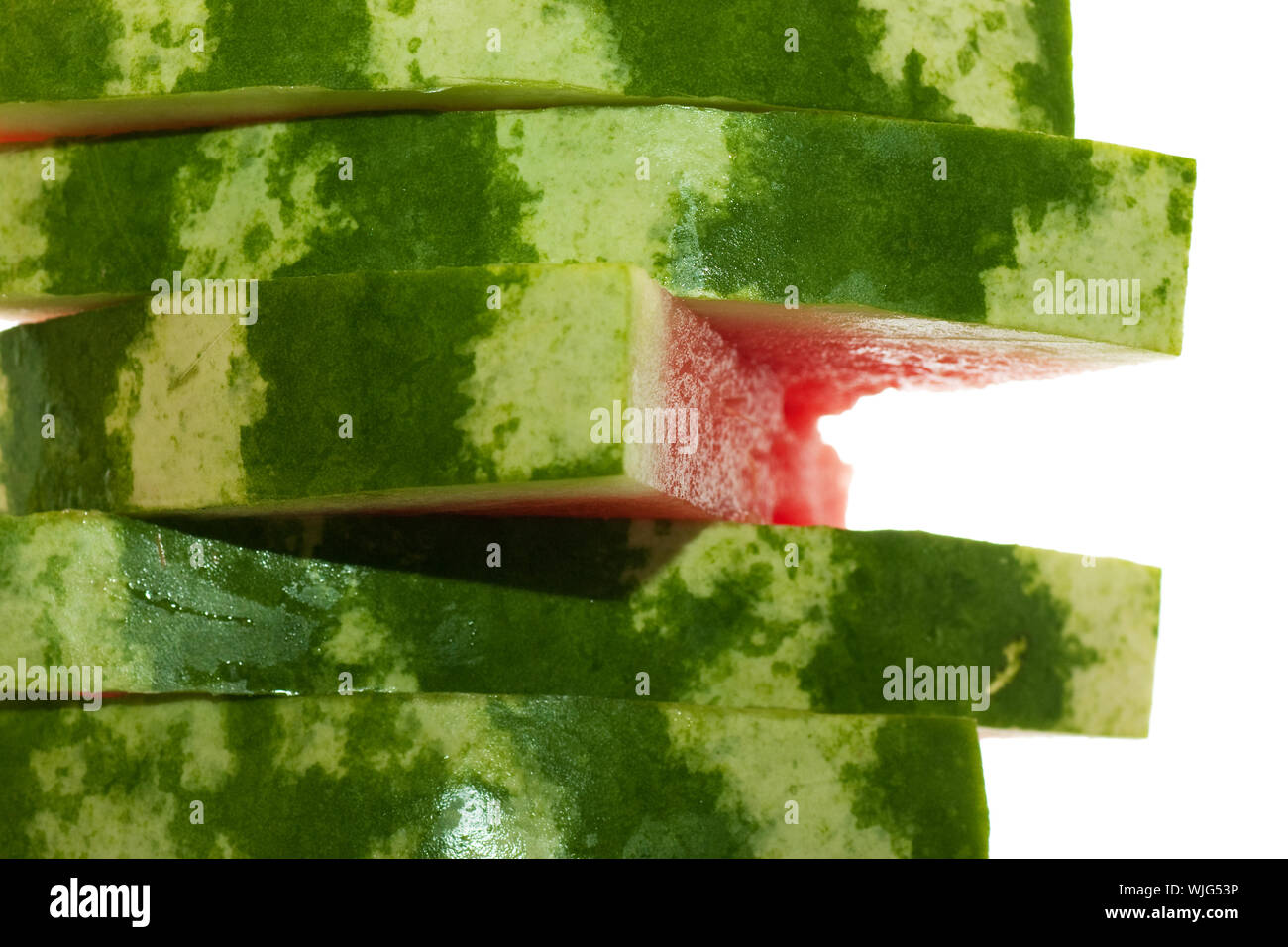 Stack of five pieces of watermelon isolated over white Stock Photo - Alamy