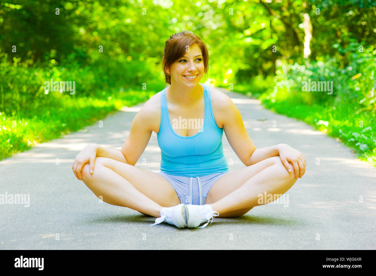 Young woman exercising, from a complete series of photos Stock Photo ...