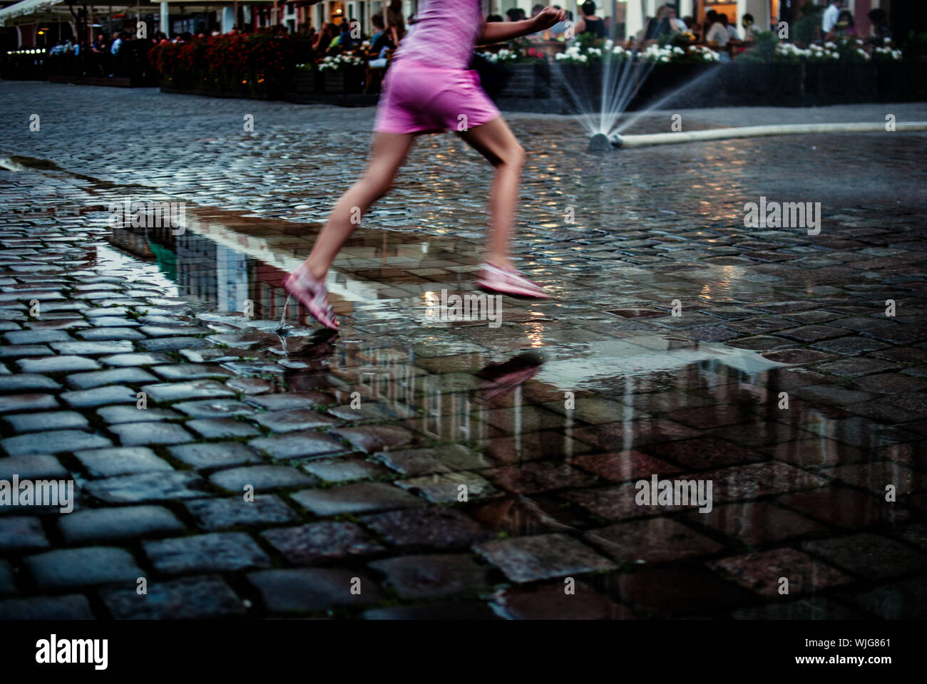 Reflection woman puddle city hi-res stock photography and images - Alamy