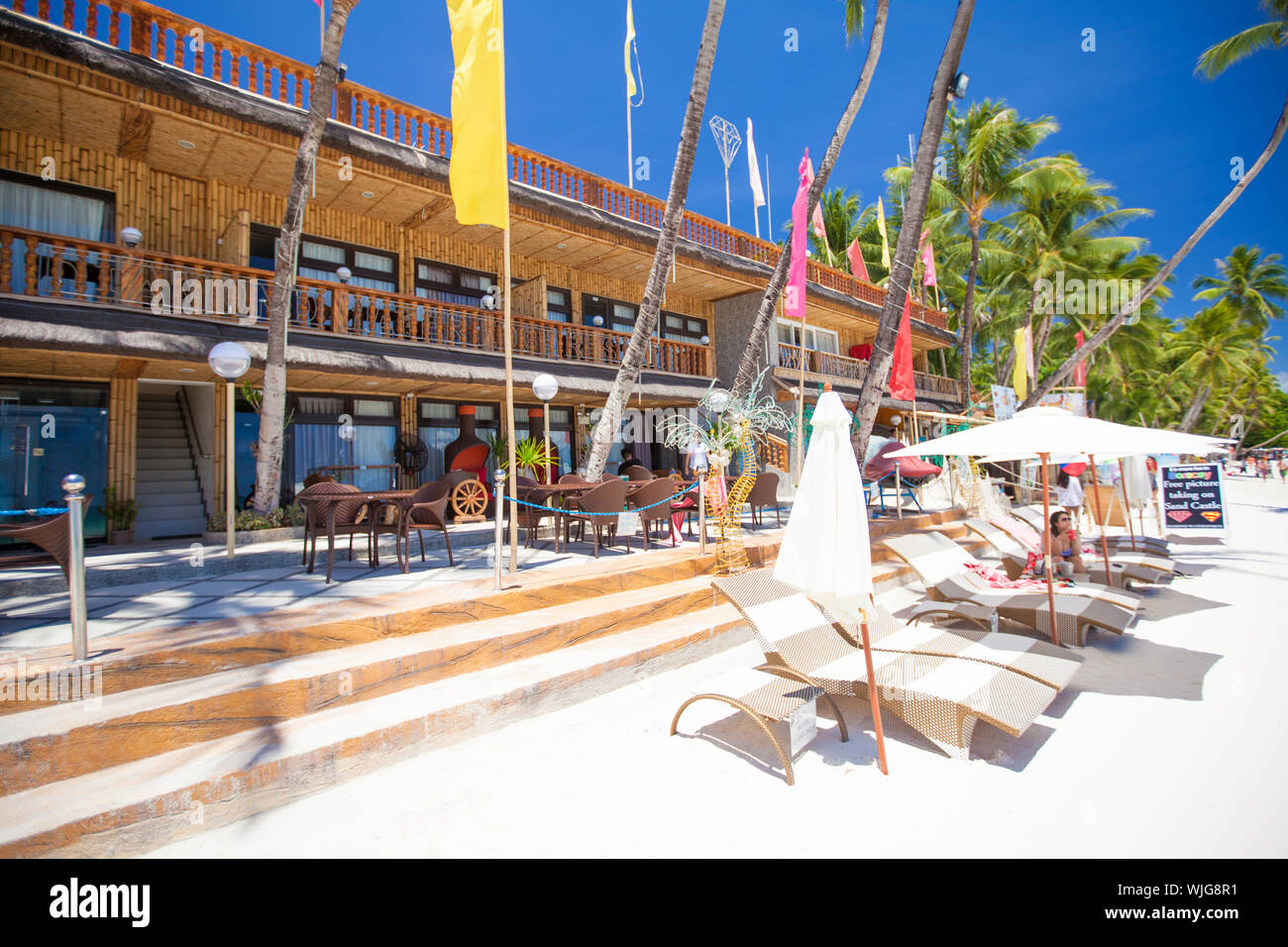 Outdoor restaurant tables on perfect white sand tropical beach Stock ...