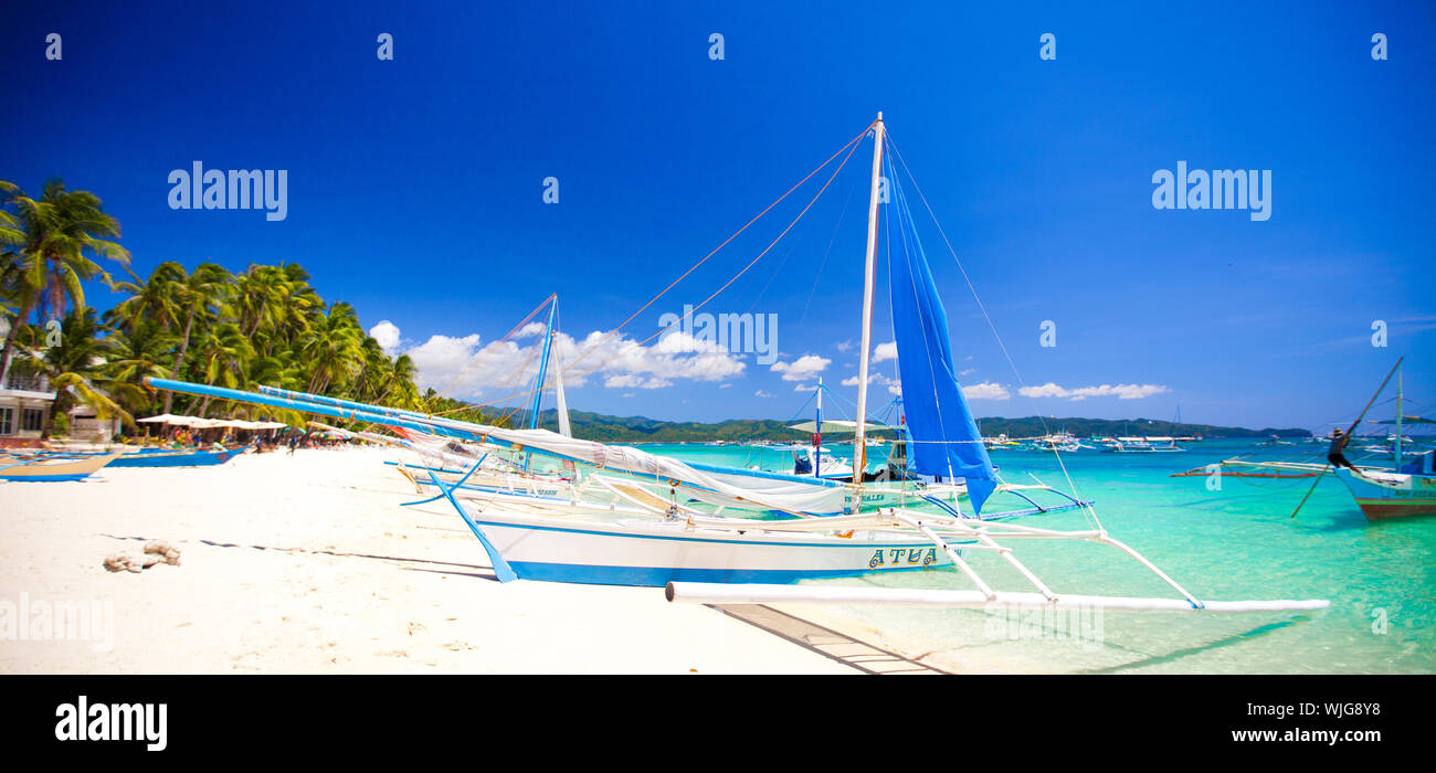 Filipino boat in the turquoise sea, Boracay, Philippines Stock Photo ...