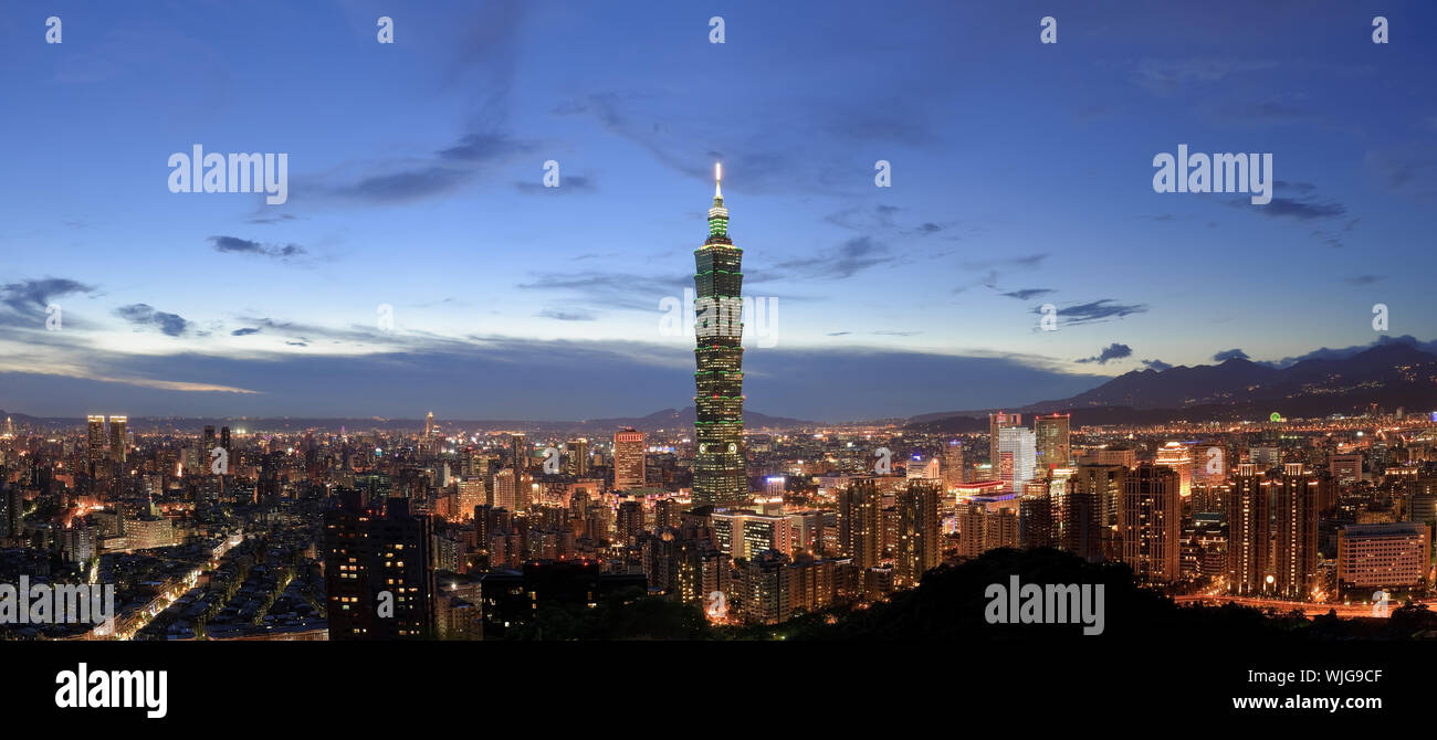 Panoramic city skyline in night with famous 101 skyscraper and ...