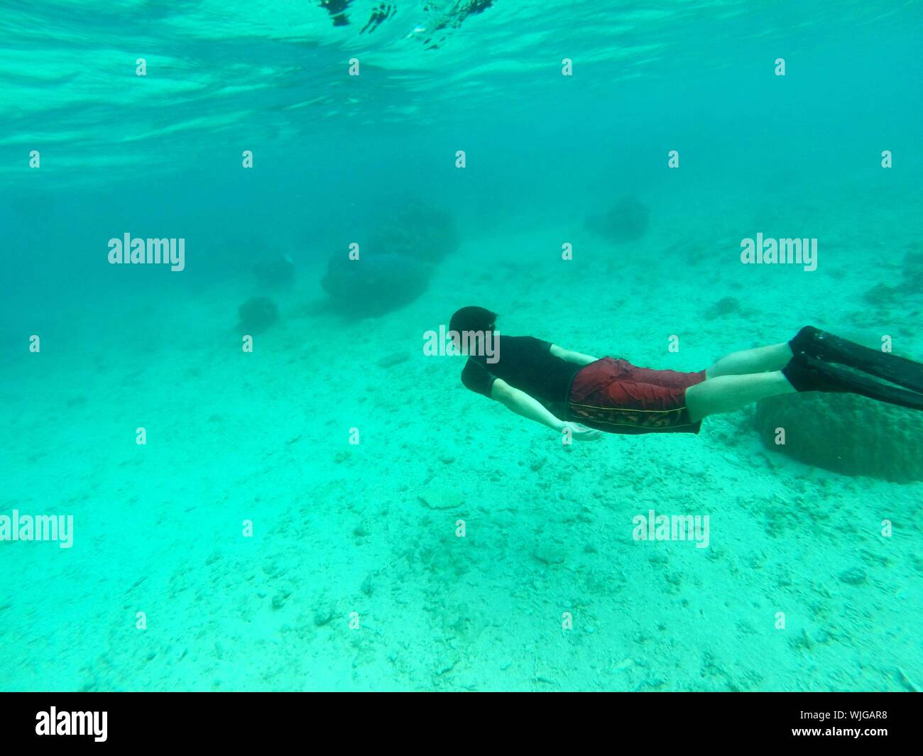 Boy diving underwater hi-res stock photography and images - Alamy