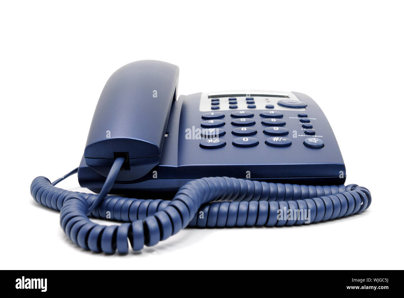 Modern blue business office telephone isolated on a white background ...