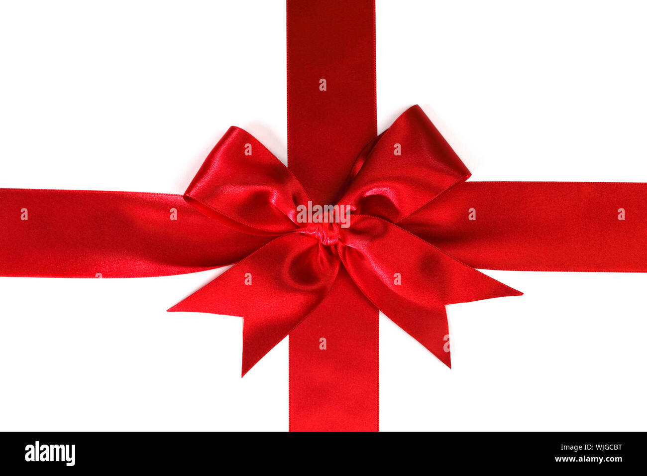 Shiny red satin bow isolated on white background Stock Photo - Alamy
