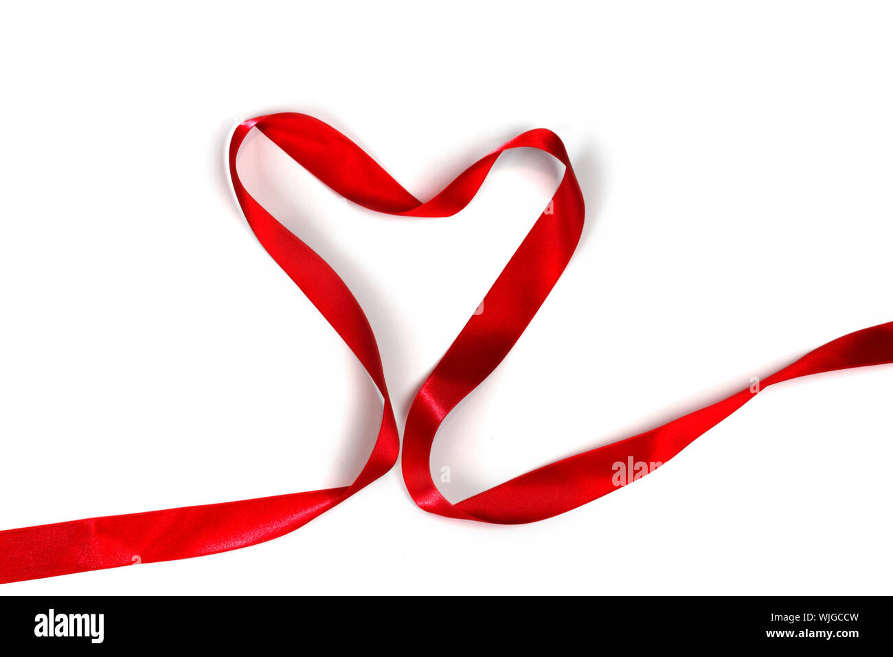 Red ribbon heart isolated on white background Stock Photo - Alamy