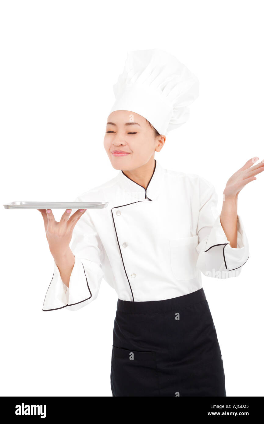 Chef holding tray and smelling something Stock Photo - Alamy
