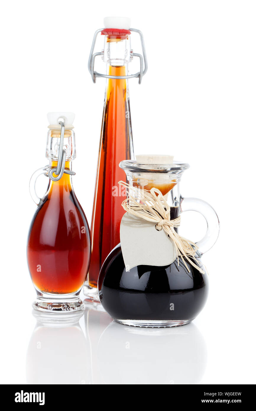 maple syrup in glass bottle or herbal syrup, ardent drink, mixture ...
