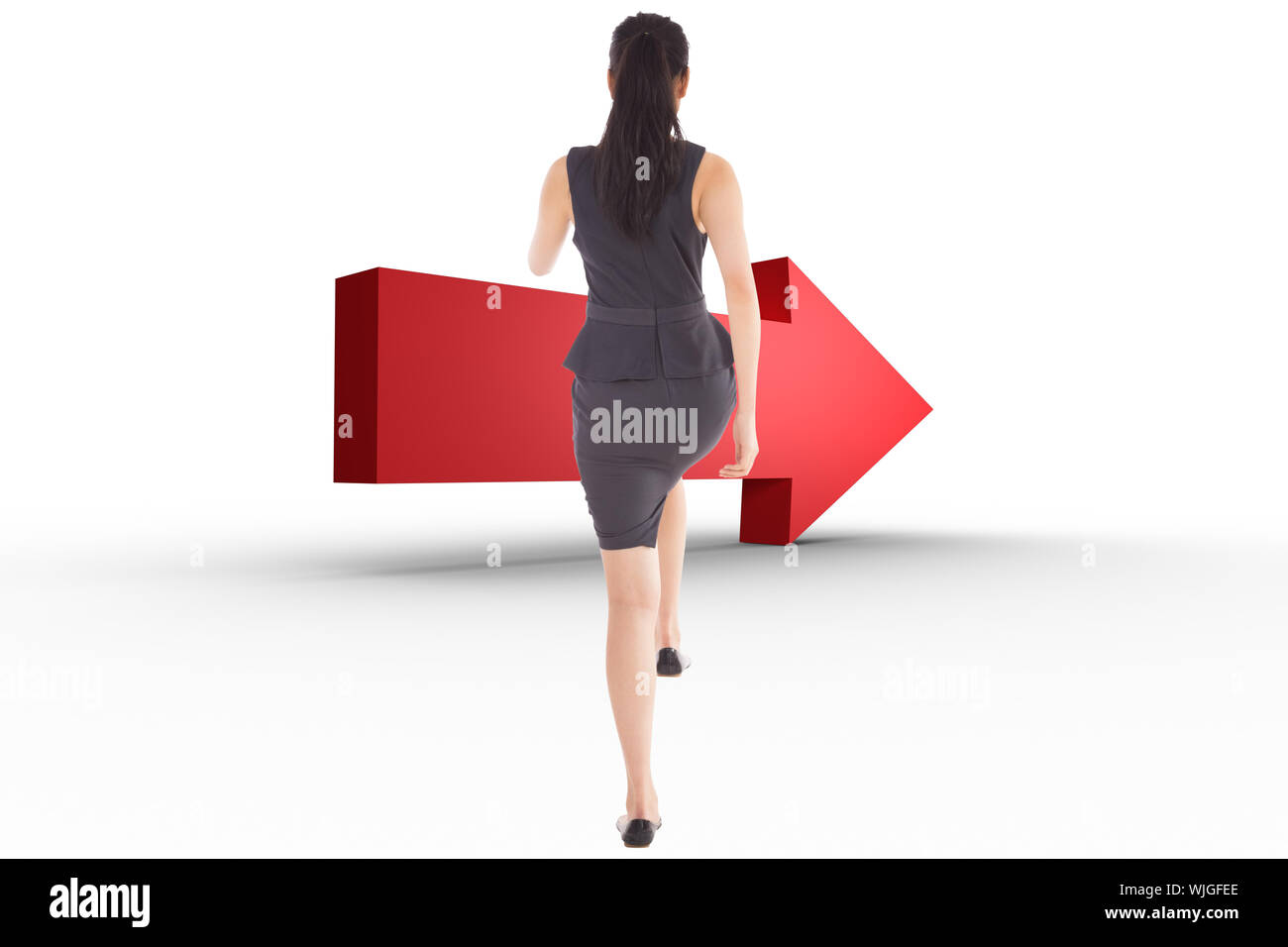 Businesswoman stepping up against red arrow Stock Photo - Alamy