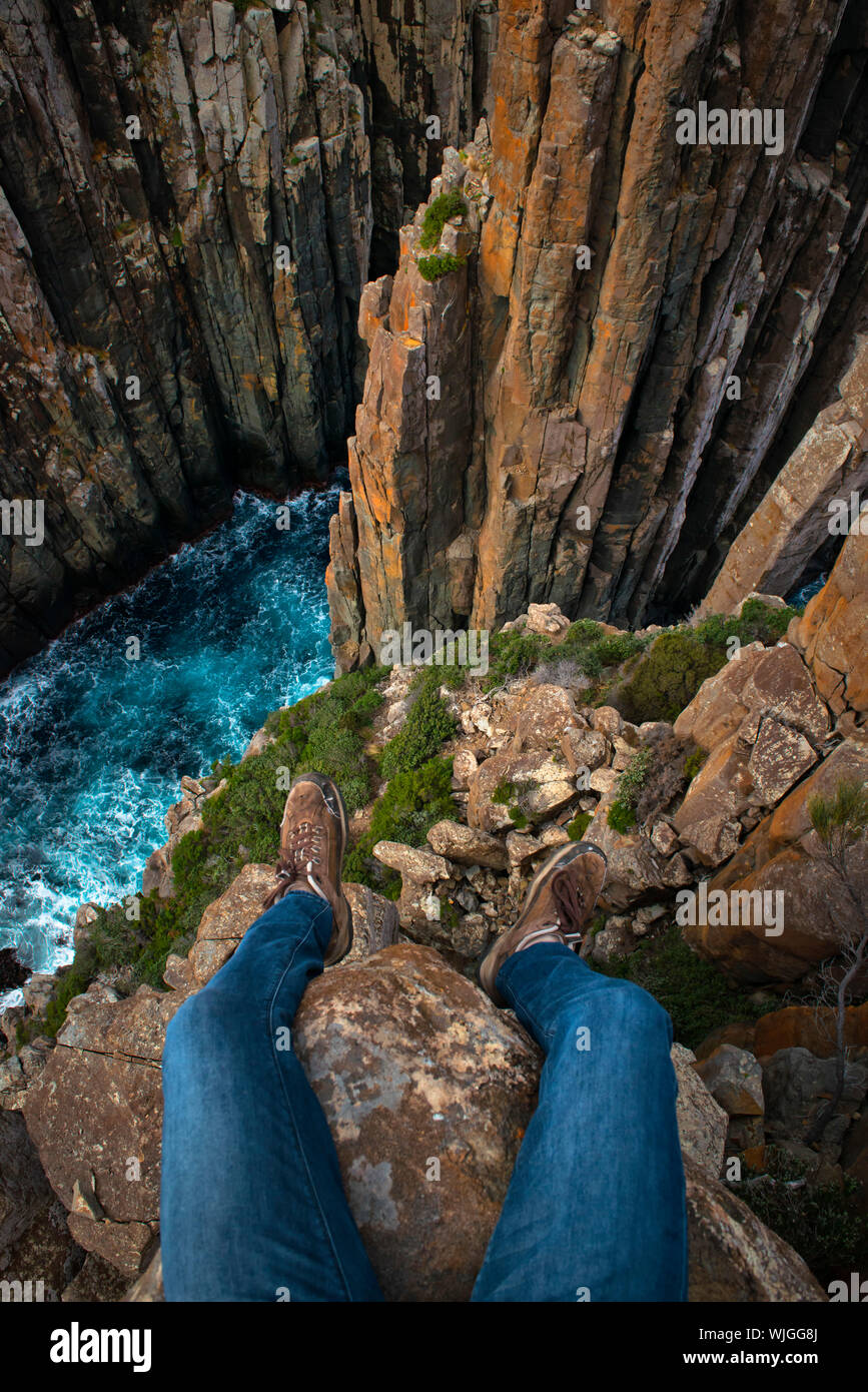 Man cliff leg hi-res stock photography and images - Alamy