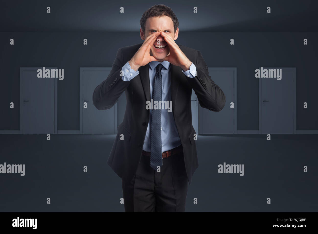 Shouting businessman against door opening to show red arrow Stock Photo ...