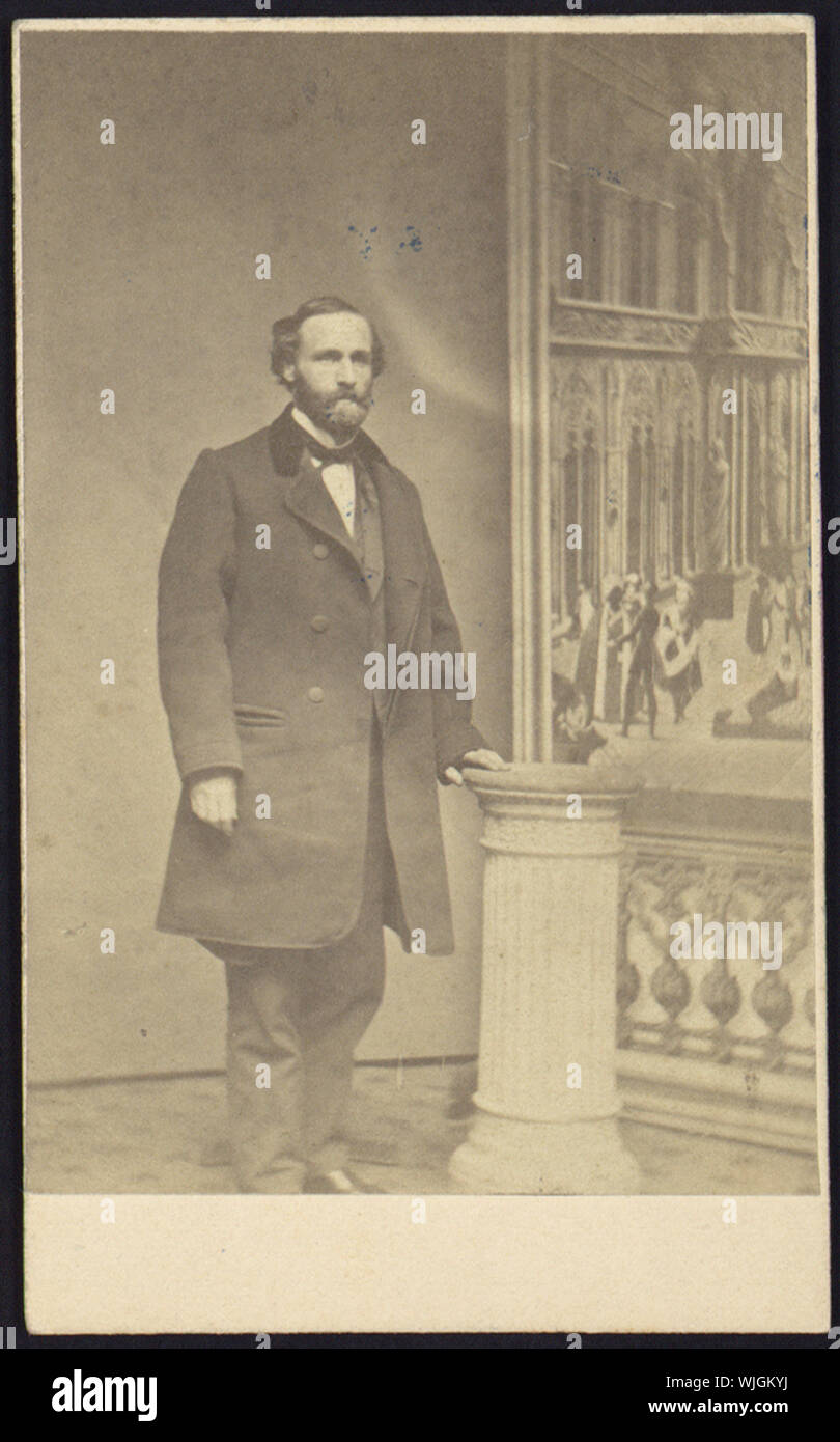 Henry L. Dawes, full-length studio portrait, standing, facing slightly ...