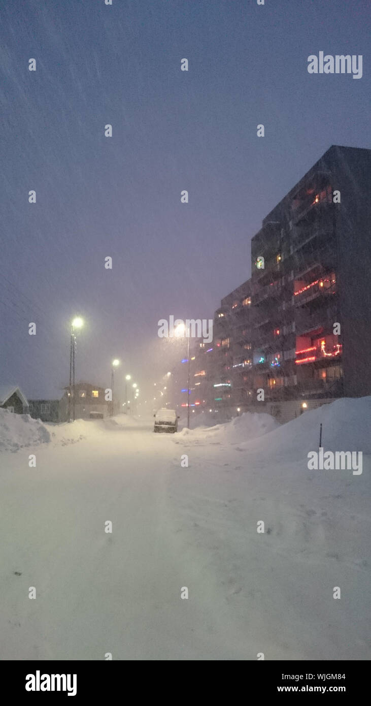 Street light at night in snow covered street hi-res stock photography ...