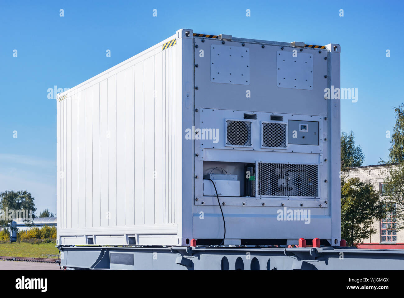 Refrigerated container 20-foot-long on the railway platform Stock Photo ...