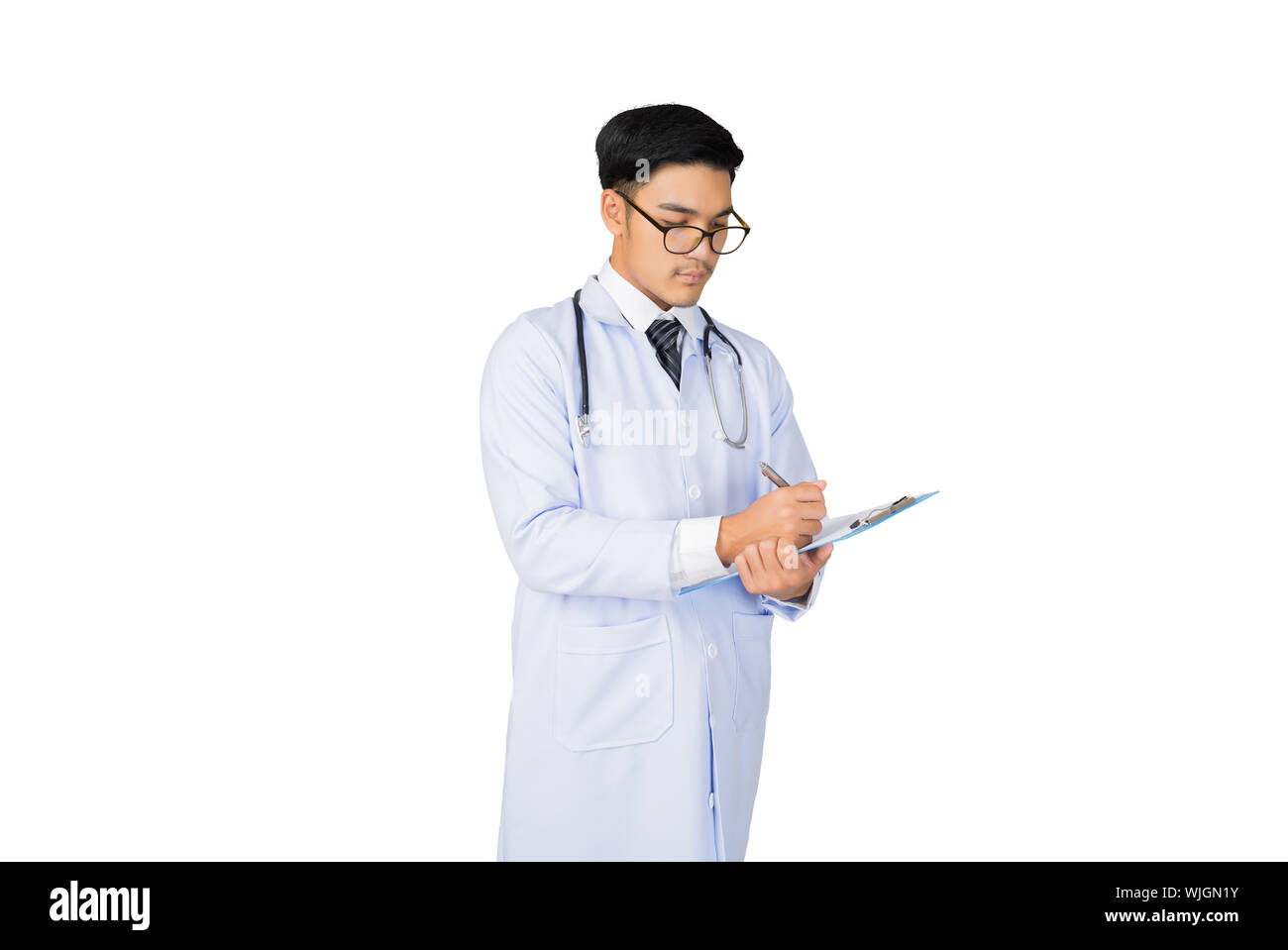 Indian doctor writing hi-res stock photography and images - Alamy