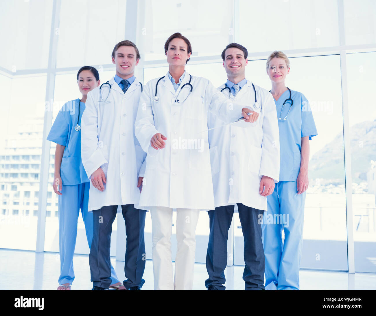 Group portrait of young doctors standing together at the hospital Stock ...