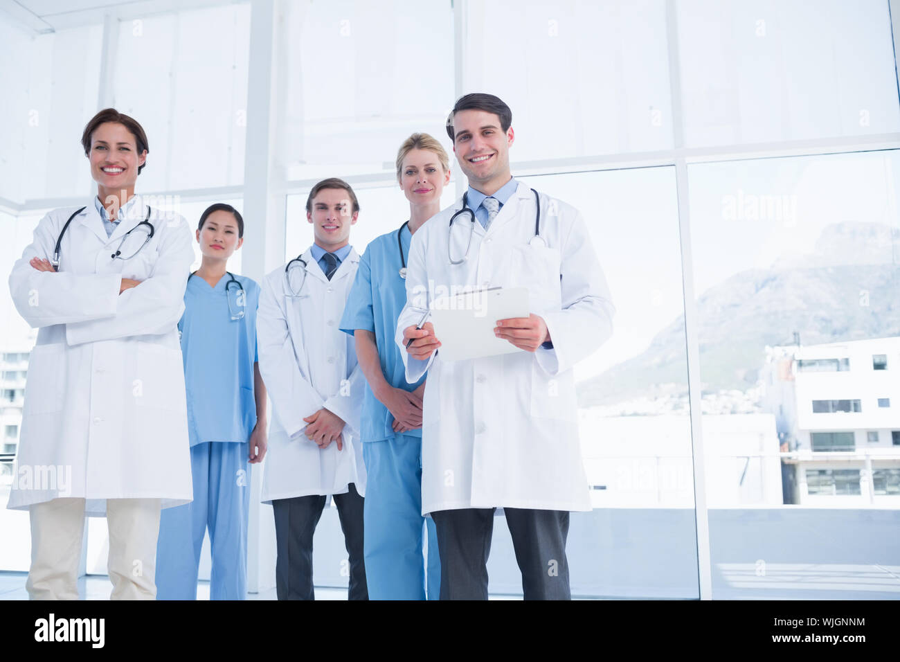 Group portrait of young doctors standing together at the hospital Stock ...