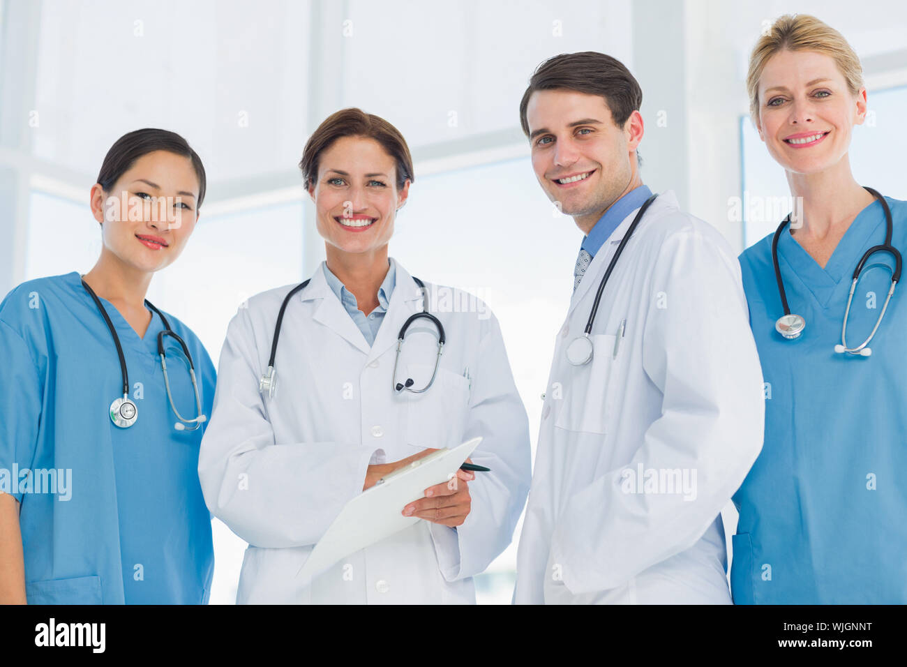 Group portrait of young doctors standing together at the hospital Stock ...