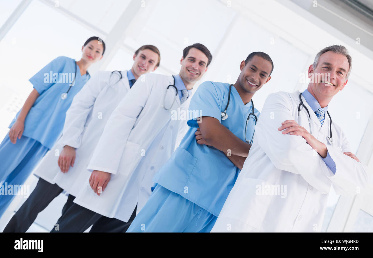 Group portrait of doctors standing in a row at the hospital Stock Photo ...