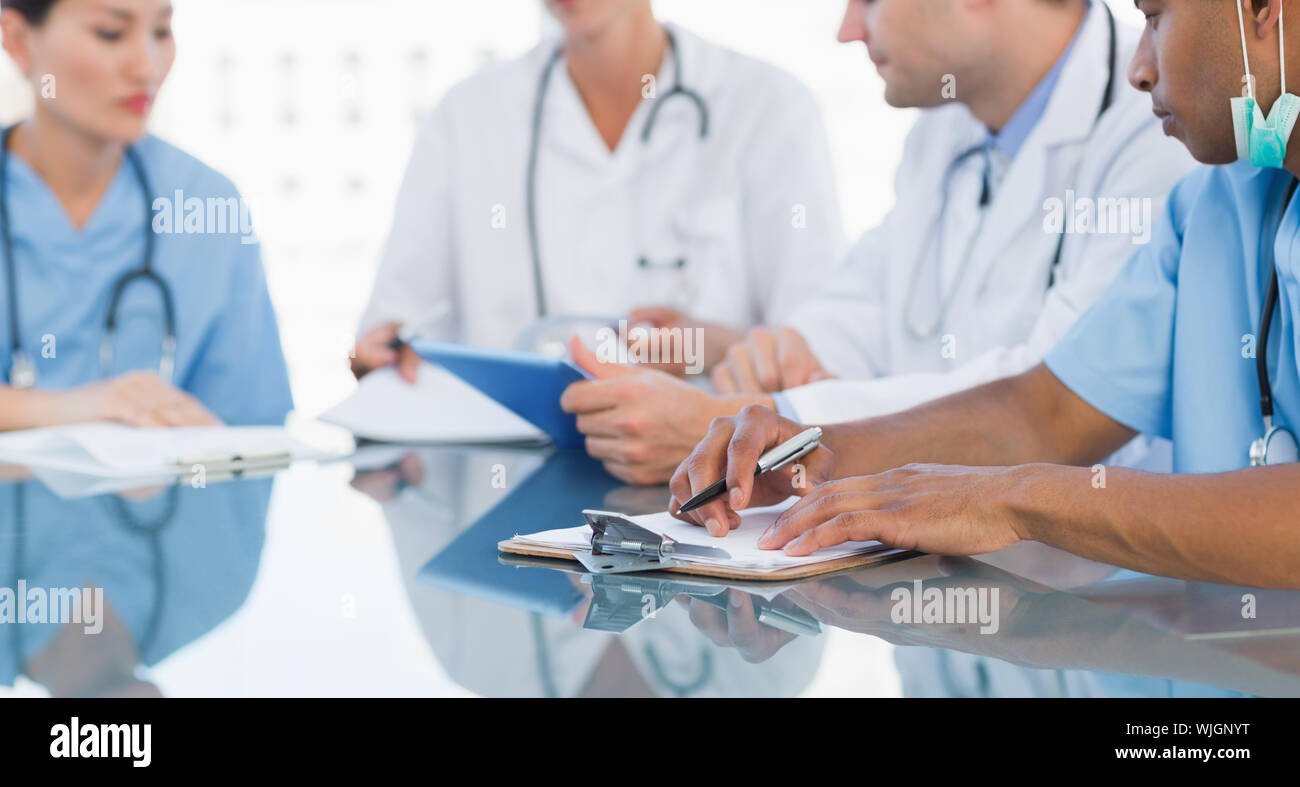 Group of young doctors in a meeting at hospital Stock Photo - Alamy