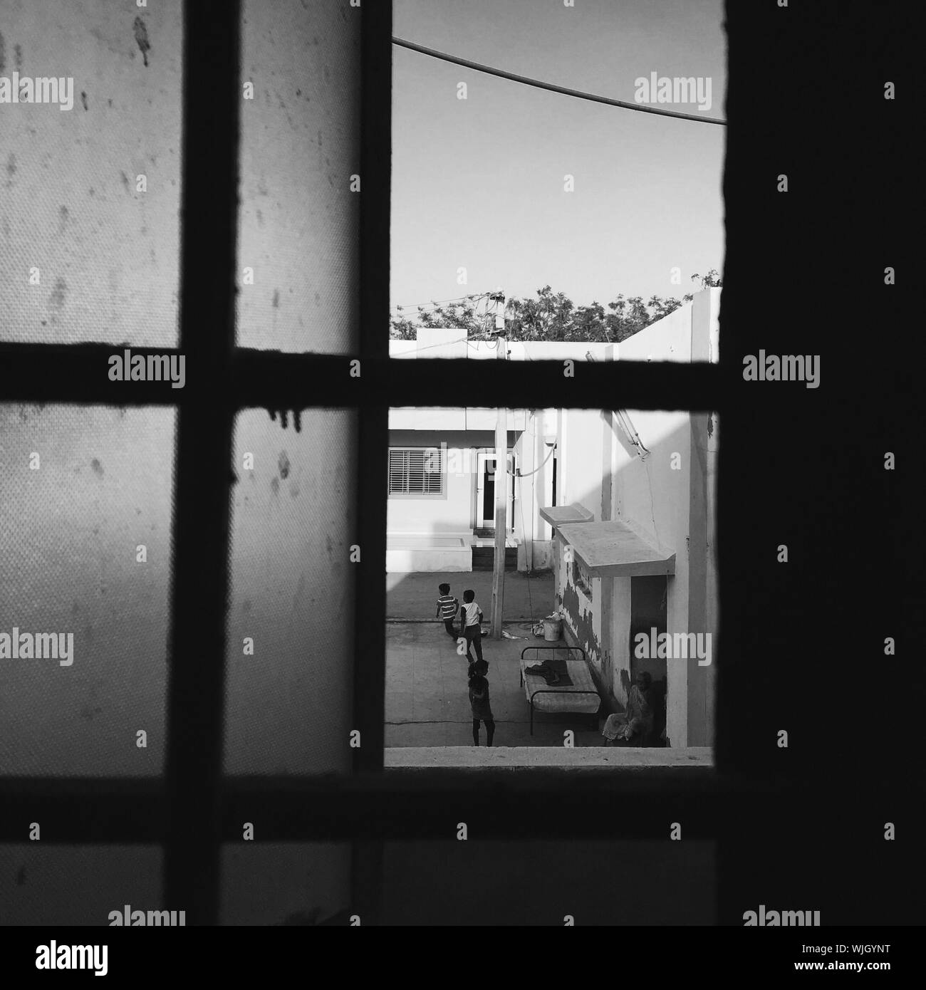 Kids by the window hi-res stock photography and images - Alamy