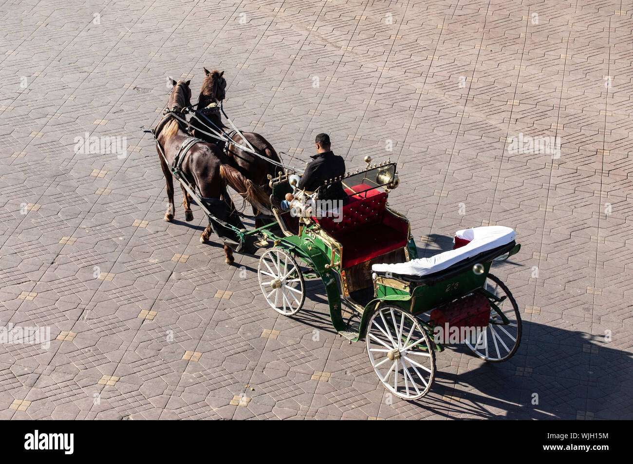 horse drawn carriage in Sunshine is waiting for guests in Marrakesh ...