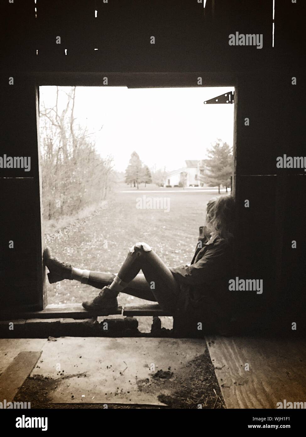 Woman broken window hi-res stock photography and images - Alamy