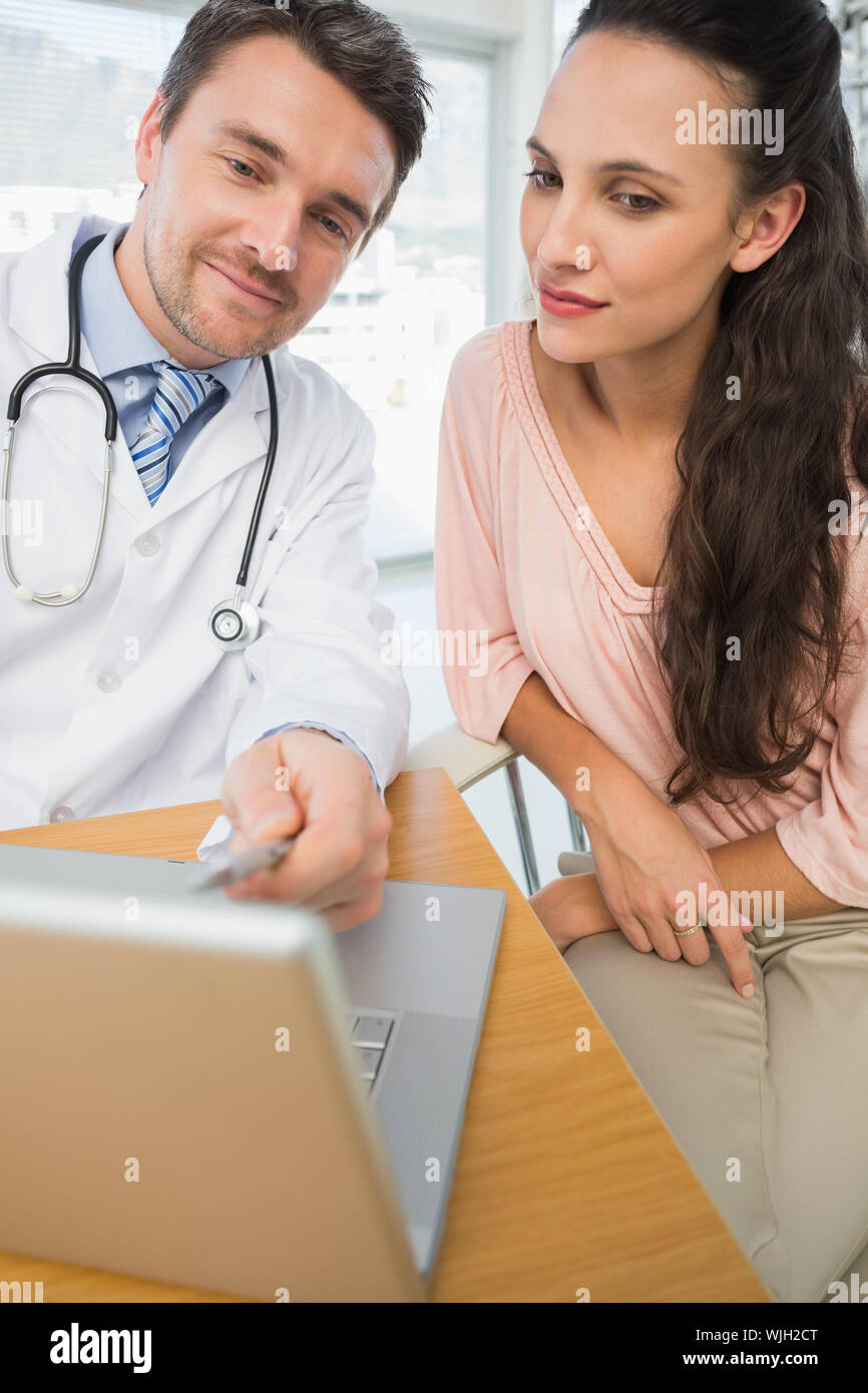 Doctor patient sitting discussing something hi-res stock photography ...