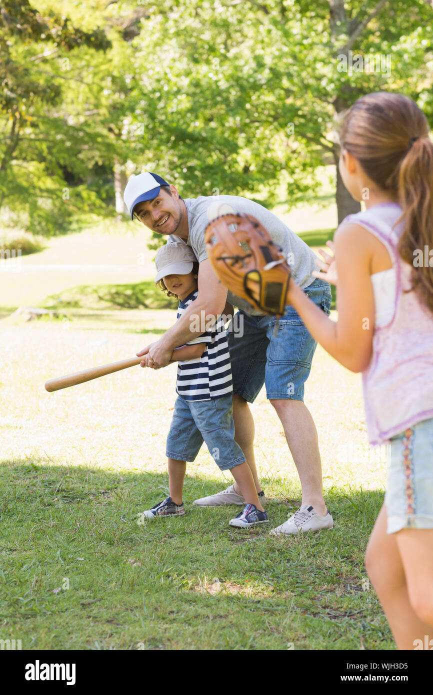 Boy and girl playing baseball hi-res stock photography and images - Alamy