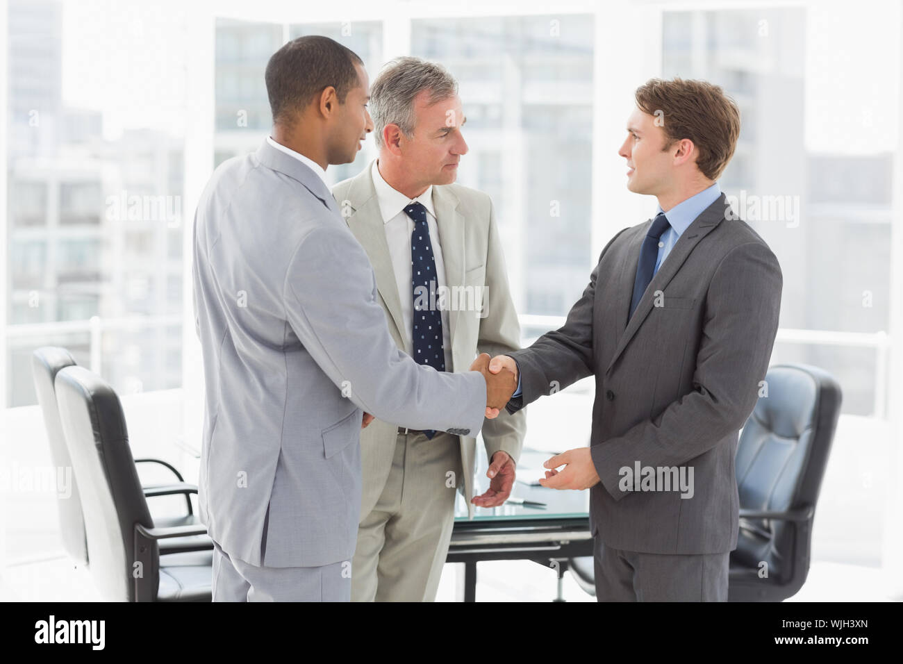 Businessman introducing new team hi-res stock photography and images ...