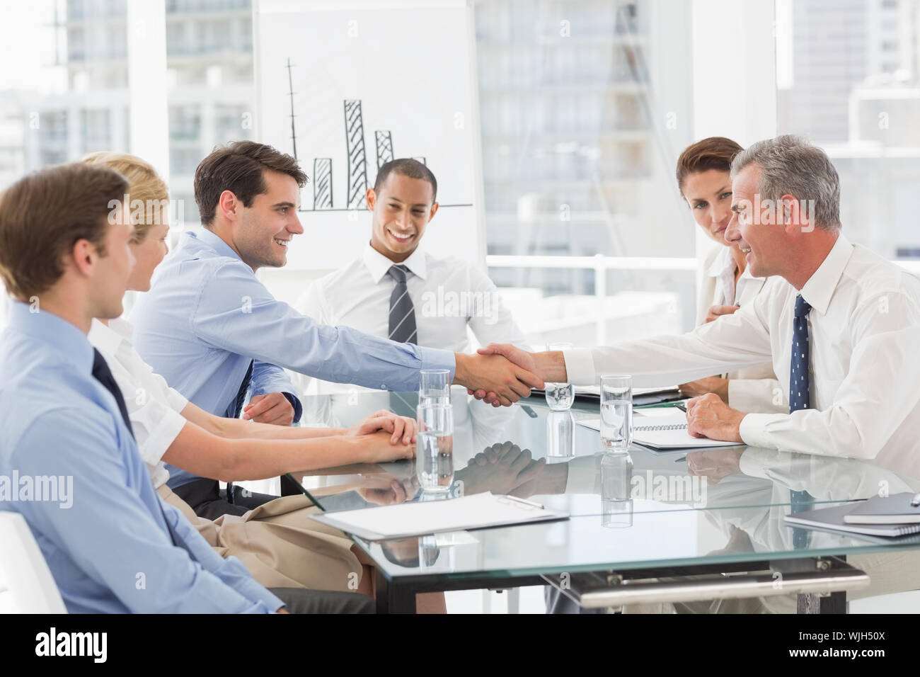 Business people making a deal at a meeting in the office Stock Photo ...