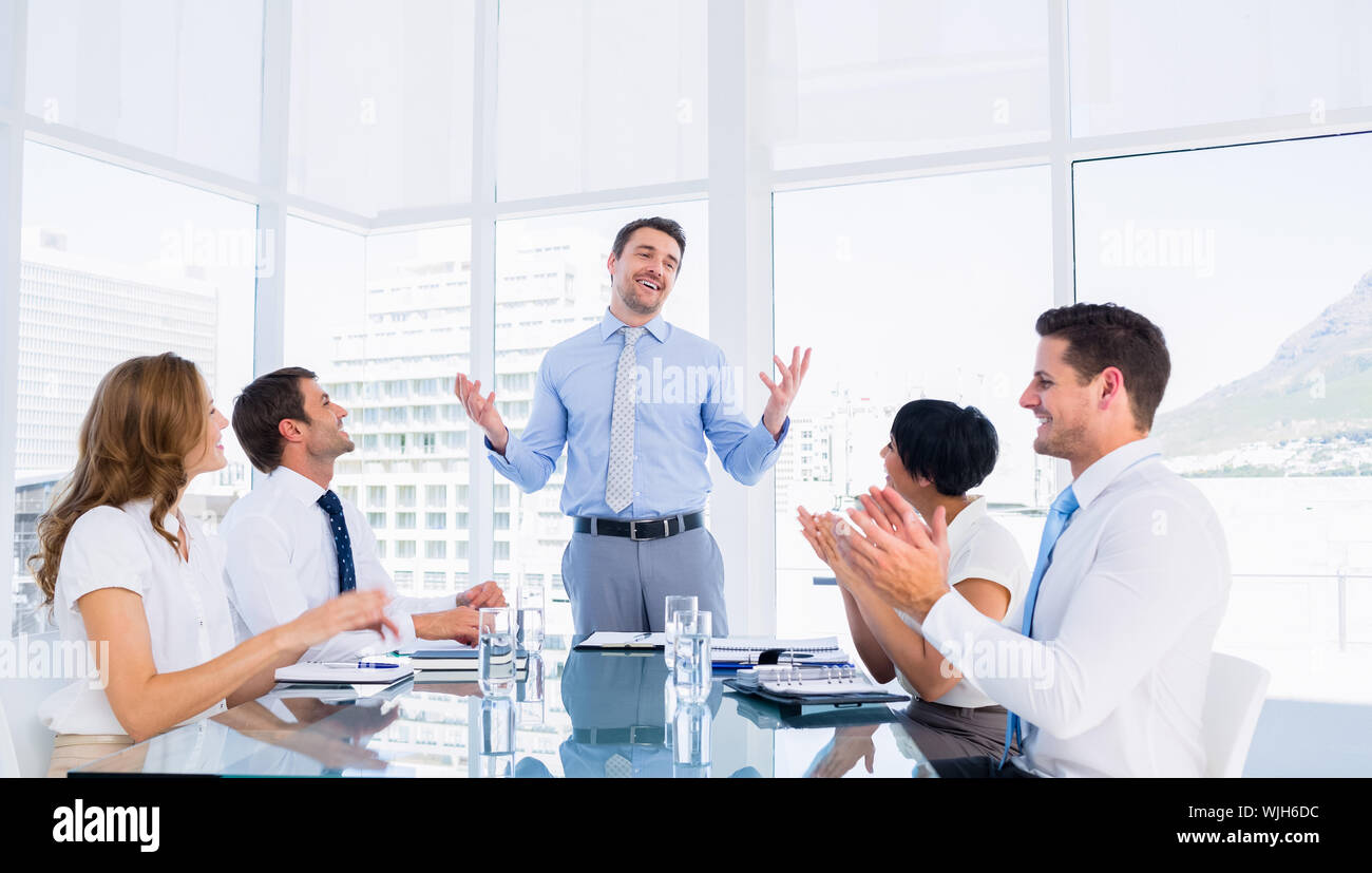 Executives Sitting Around Conference Table High Resolution Stock ...