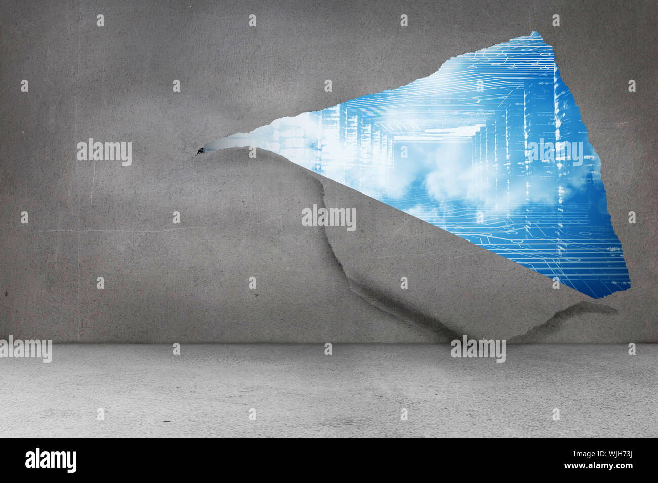 Rip on wall showing technology interface Stock Photo - Alamy