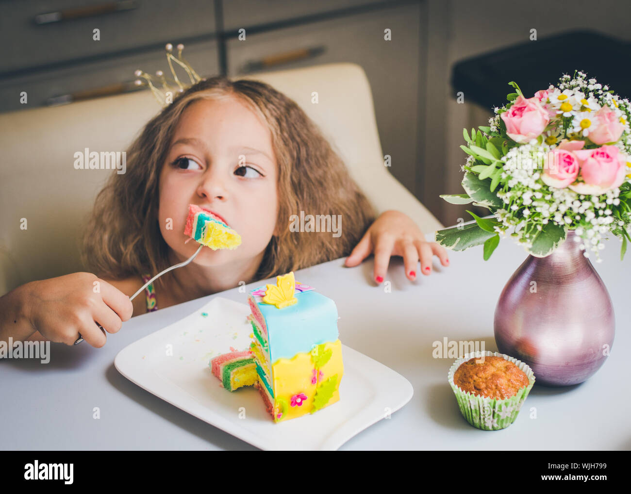 Girl eating cake hi-res stock photography and images - Alamy