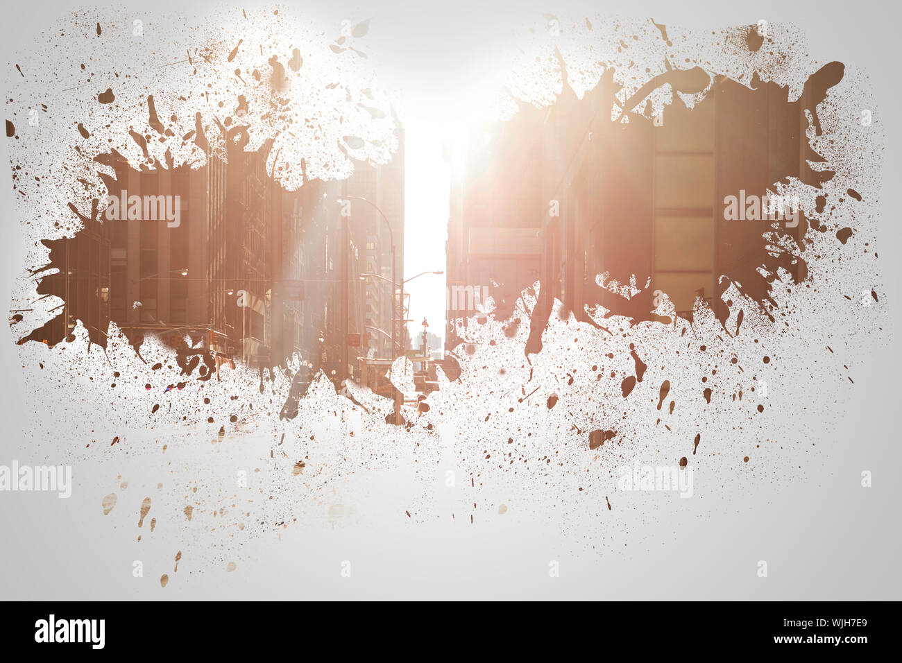 Splash on wall revealing cityscape Stock Photo - Alamy