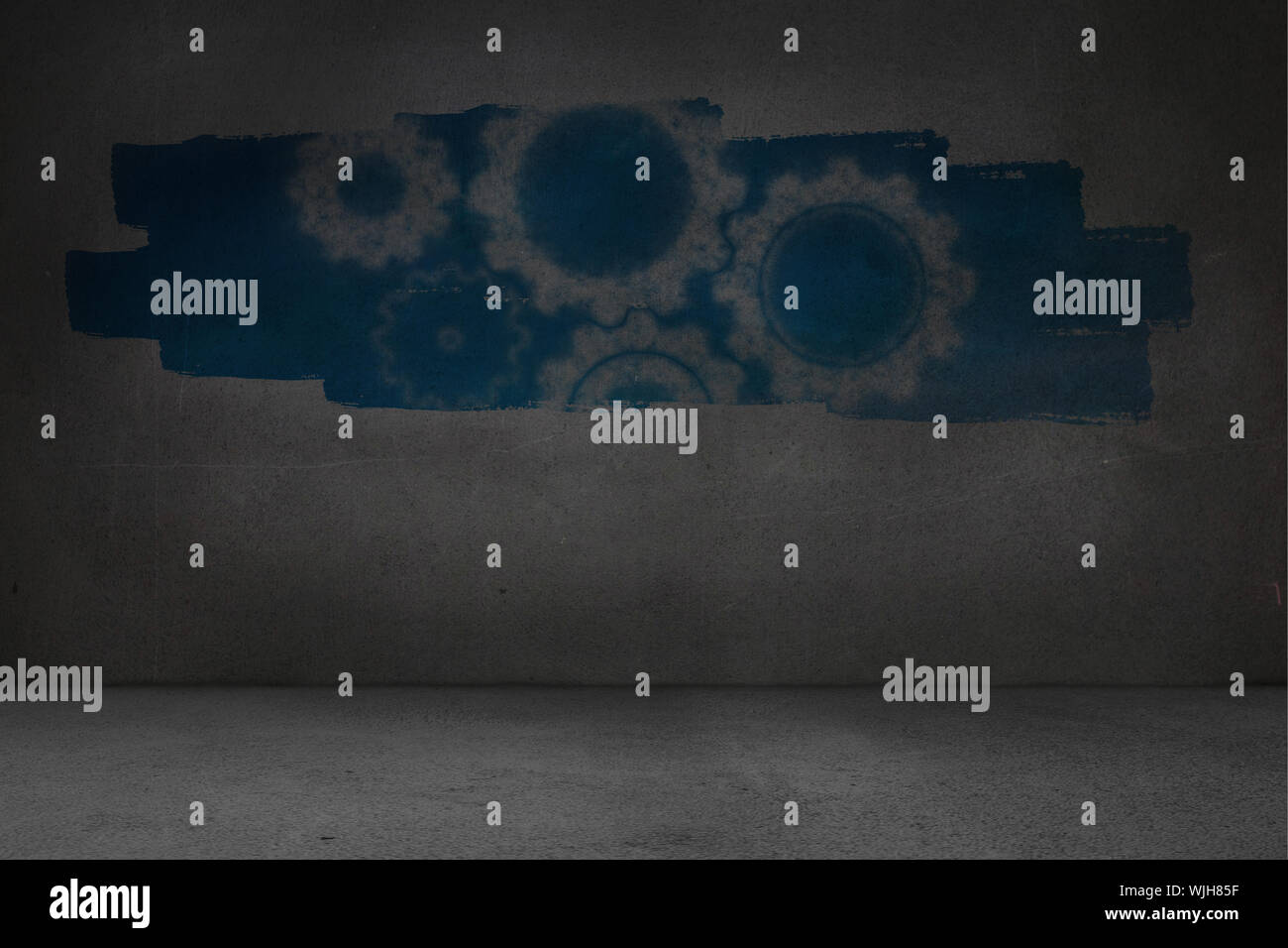 Display on wall showing cogs and wheels in clouds Stock Photo - Alamy