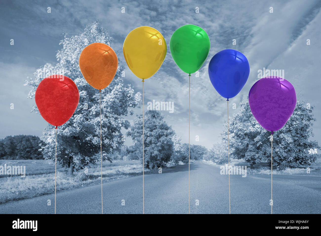 Balloons above a road Stock Photo - Alamy