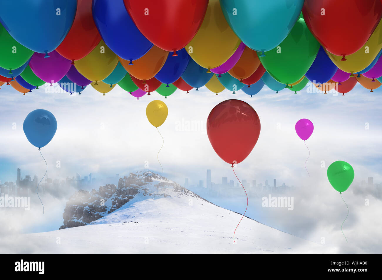 Many colourful balloons above snow Stock Photo - Alamy
