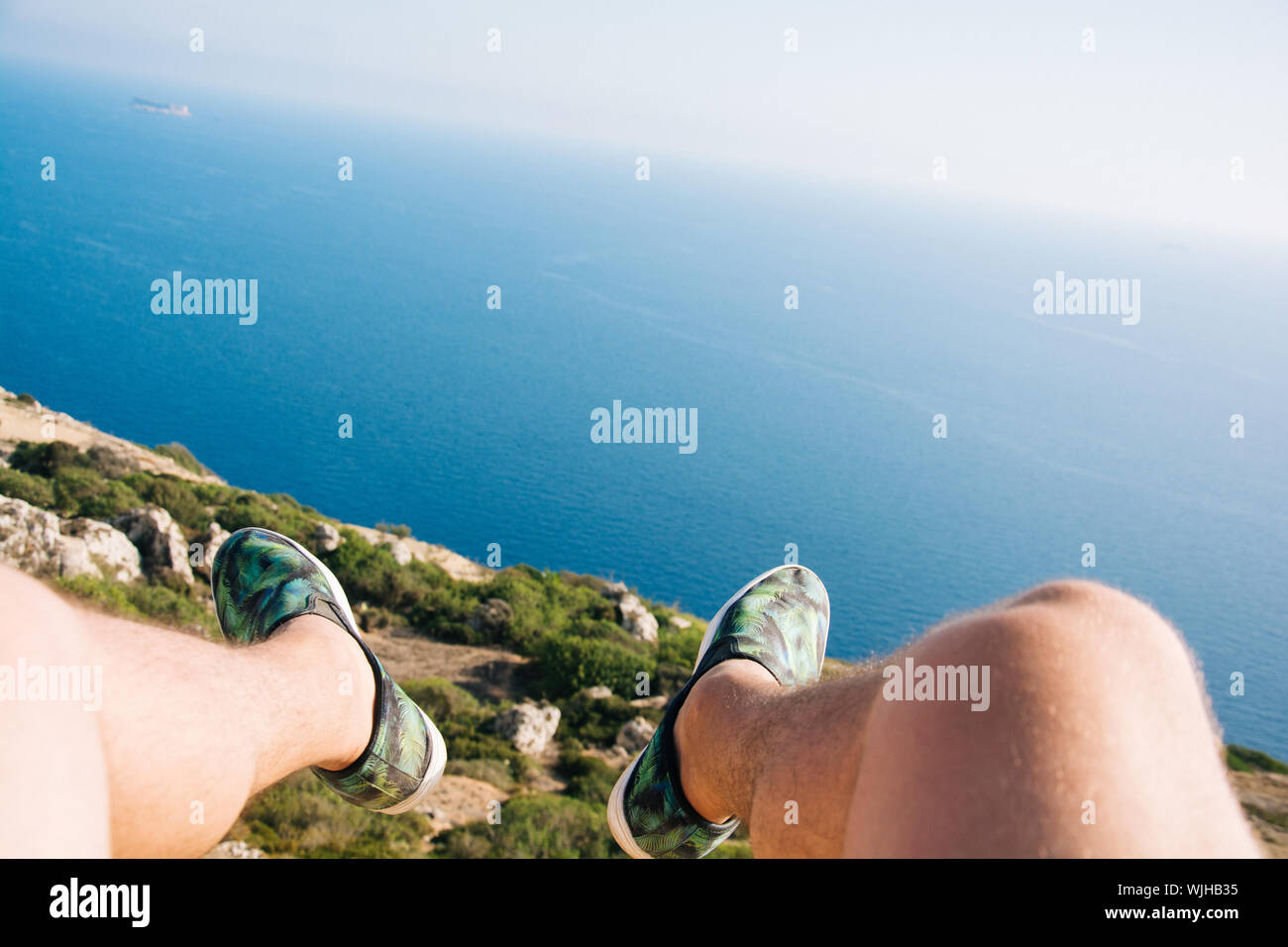 Dangling leg hi-res stock photography and images - Alamy