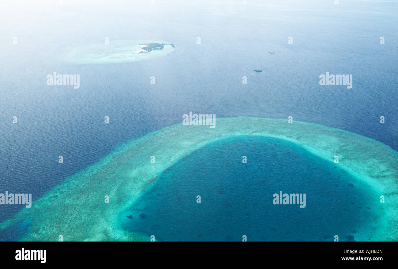 Group of atolls and islands in Maldives from aerial view Stock Photo ...