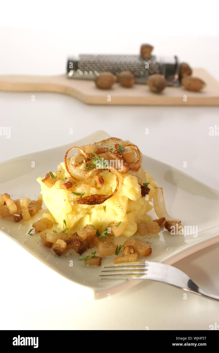 mashed potato with onion ring and bacon Stock Photo - Alamy