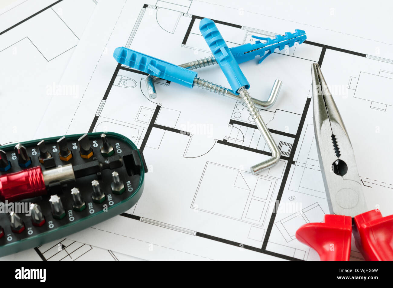 Building plan with selection of construction tools Stock Photo - Alamy