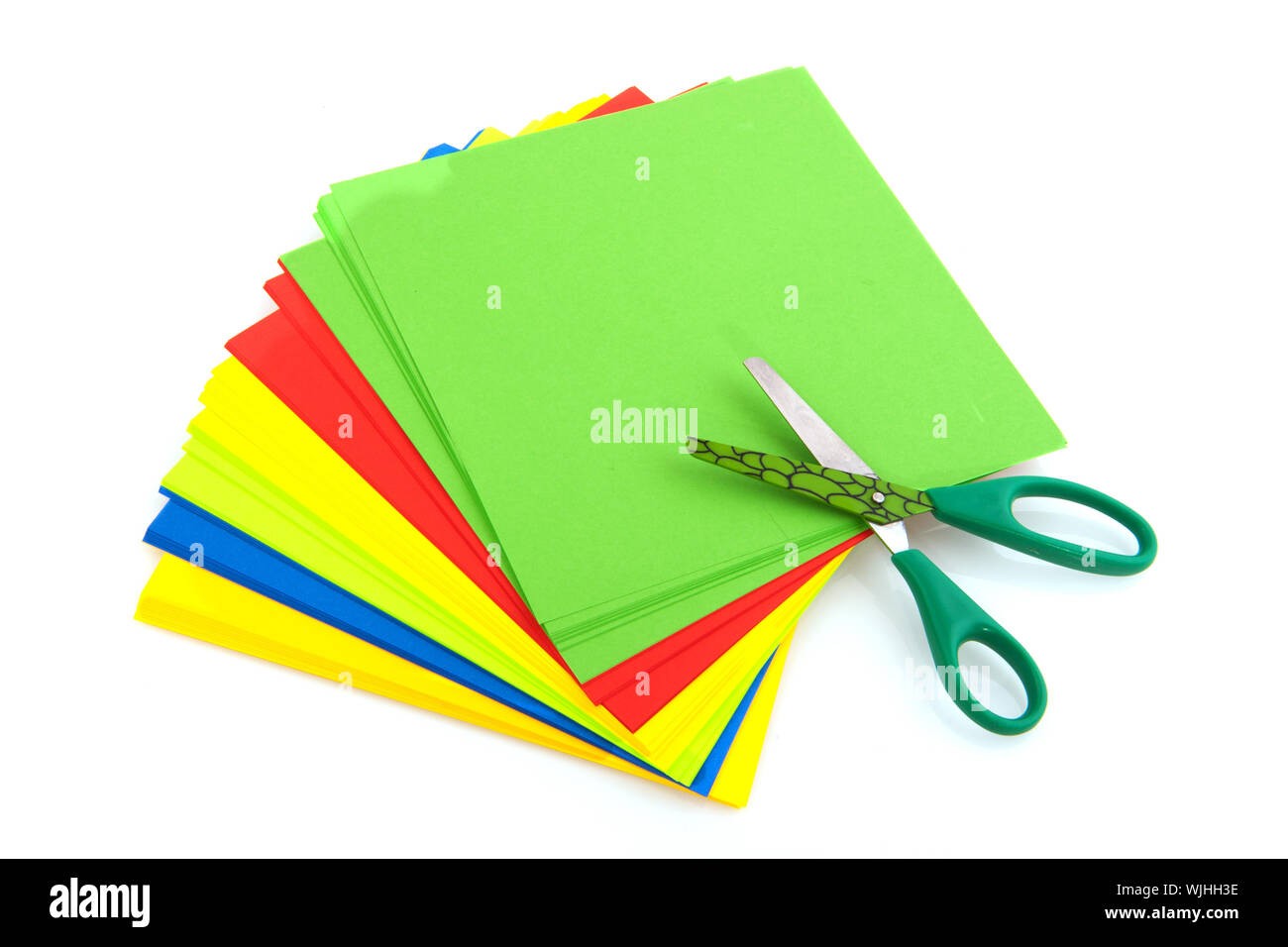 Child scissors with colorful paper isolated over white background Stock ...