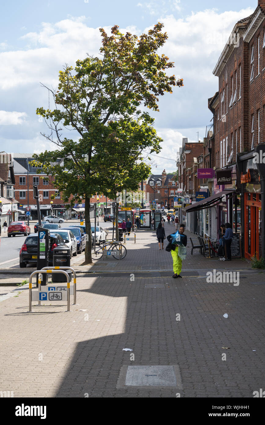 People out and about and shopping in Bridge Street, Pinner, Middlesex ...